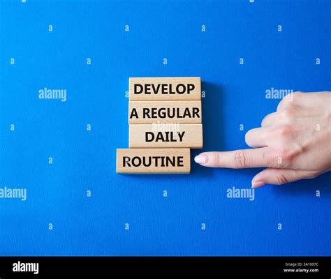 Develop A Regular Daily Routine Symbol Concept Words Develop A Regular Daily Routine On Wooden