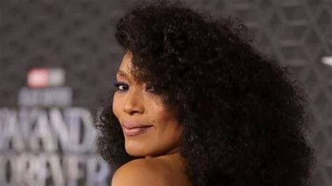 A Look Back At Angela Bassetts Most Iconic Beauty Moments Essence Essence