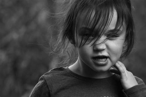Premium Photo Close Up Portrait Of Cute Girl Making Face