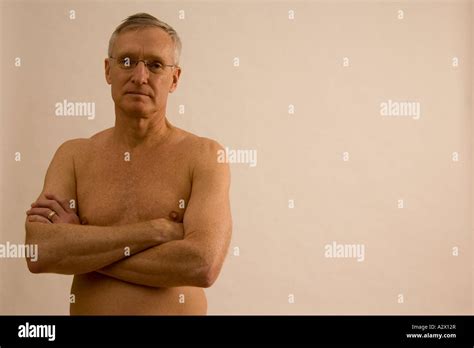 White Man Stands Naked With His Arms Crossed Stock Photo Alamy