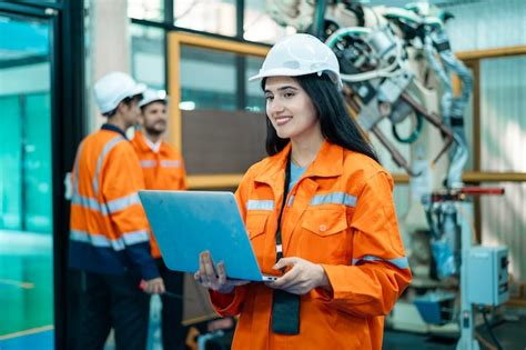 Premium Photo A Group Of Robotics Engineers Working With Programming