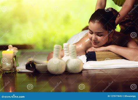 Portrait Of Asian Woman Is Relaxing In Spa Massage Thai Massage Stock