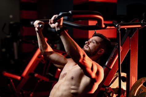 Premium Photo Athletic Handsome Man With Muscular Body Working Out