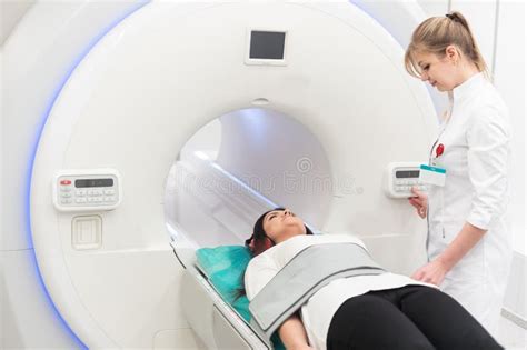 Female Patient Undergoing Mri Magnetic Resonance Imaging In Hospital