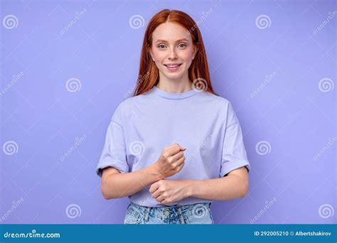 Young Red Haired Happy Girl Working As A Sign Language Interpreter