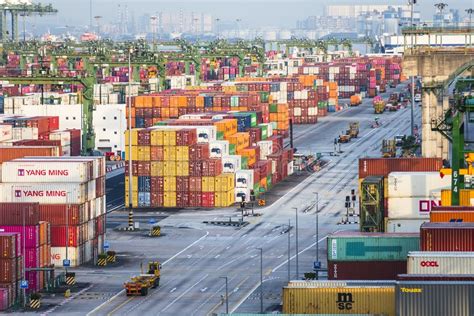 View On The Cargo Containers Stored In The Container Terminal Of Singapore Sea Port Editorial