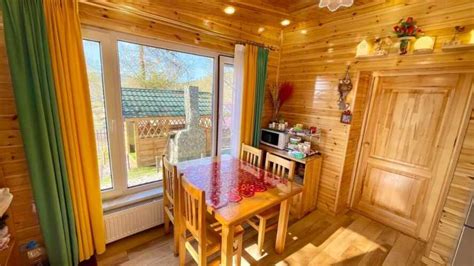 СҮХБААТАР дүүрэг 20 р хороо Бэлх зусланд модон дунд маш гоё зуслангийн 4н улиралын 127мкв байшин