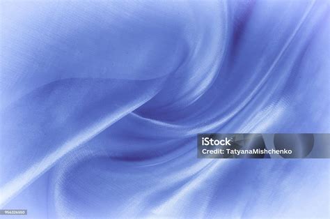 배경 질감 패턴입니다 블루 실크 직물입니다 부드럽고 우아한 블루 실크 또는 공단 배경으로 사용할 수 있습니다 고급 스러운 크리스마스 배경 또는 새 해 배경 디자인 0명에