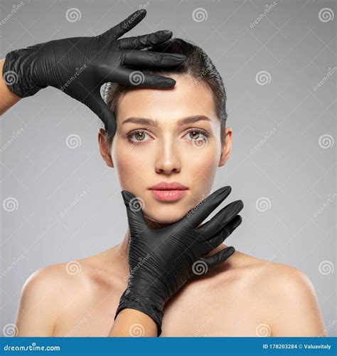 Doctor Checks A Skin Before Plastic Surgery Face Skin Check Before