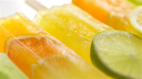 Summer Citrus Popsicle Array Their Orange Lemon And Lime Hues Vibrant Against A White