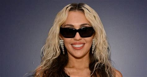 Miley Cyrus Flaunts Fit Figure In White Hot Swimsuit Black Slingback