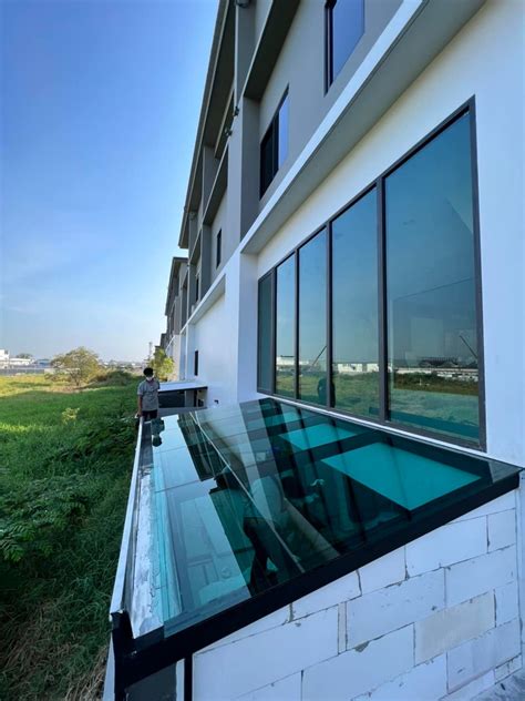 กระจกบานหน้าต่าง ลามิเนตเขียว ความหนา12 76มม กลาสโฮมท็อปทรี กลาสโฮมท็อปทรีคอนสตรัคชั่น