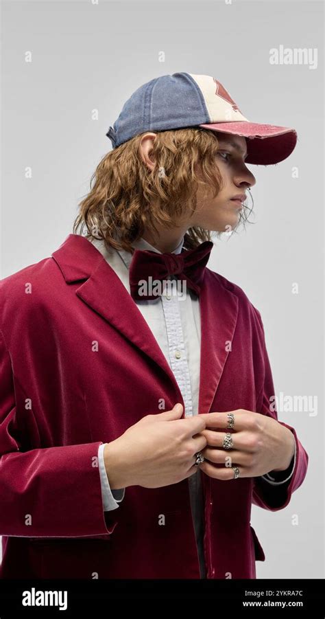 Stylish Young Guy Wearing Red Velvet Blazer Grey Pants Cap And