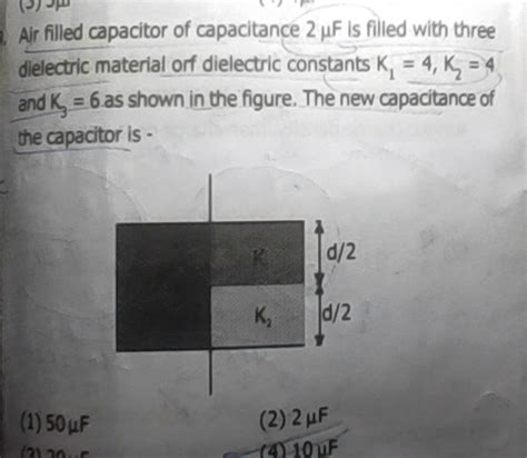 Air Filled Capacitor Of Capacitance 2 Mu Mathrm {~f} Is Filled With Thr