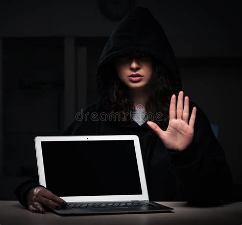 Female Hacker Hacking Security Firewall Late In Office Stock Image