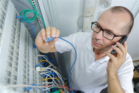 Man Fixing Server Network In Data Center Room Stock Image Image Of Support People