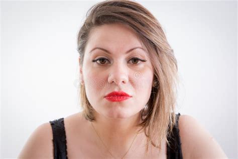 Close Up Serious Blond Woman Staring At The Camera Stock Image Image