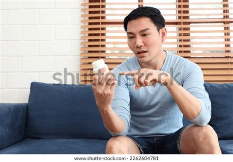 Handsome Man Holding Reading Instructions On Stock Photo Shutterstock