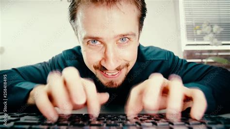 Man Extreme Fast Typing And Stare Into Camera 4k Low Angle View From