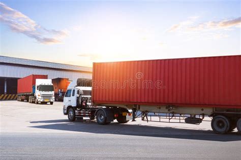 Semi Trailer Trucks On The Parking Lot At Warehouse Trucks Loading Goods At Dock Warehouse