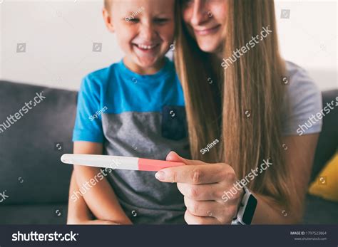 Mom Showing Her Son Pregnant Test Stock Photo Shutterstock