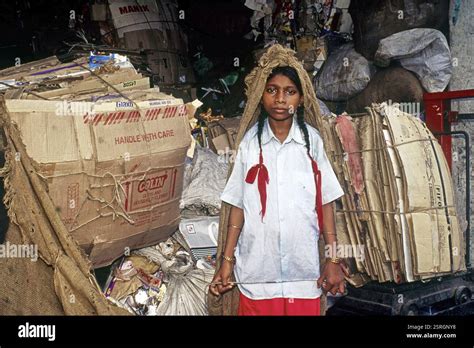Rag Picker Girl With Garbage Collection Bag On Shoulder Mumbai Rag Picker Girl With Garbage Collection Bag On Shoulder Mumbai