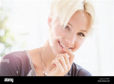 Portrait Of Blonde Woman Smiling Stock Photo Alamy