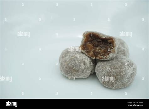Mochi With White Powder That Has Been Opened With Chocolate Filling And