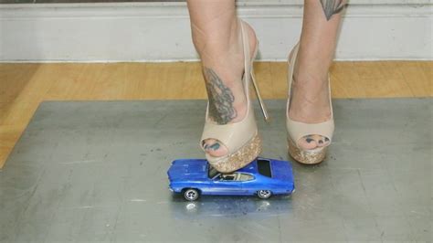Giantess Atari Queen Destroys A 1970s American Hand Built Car In Sexy Heels Closeup Ground View