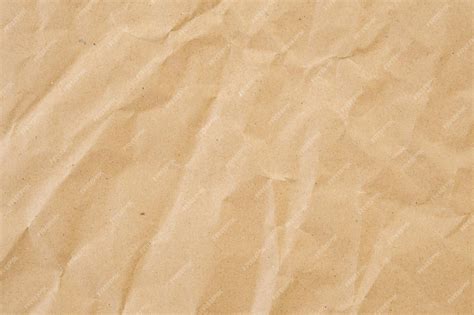 추상적인 갈색 ⁇ 그러진 주름진 재활용 종이 질감 배경 프리미엄 사진