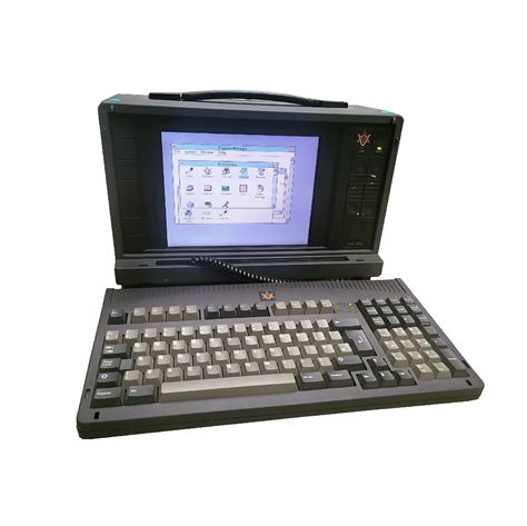 Early Luggable Computer With Flat Screen And Swing Down Keyboard