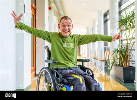 Caucasian Adult Man With Cerebral Palsy Stretching Arms Celebrating He