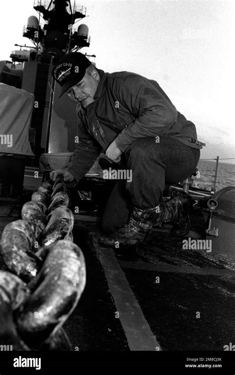 Boatswains Mate Seaman David Schefdorf Inspects The Anchor Chain Of