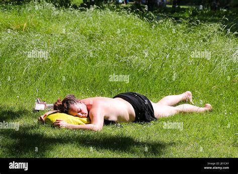 London UK Th May A Woman Sunbathing In St James Park On A Hot And Sunny Dy In The