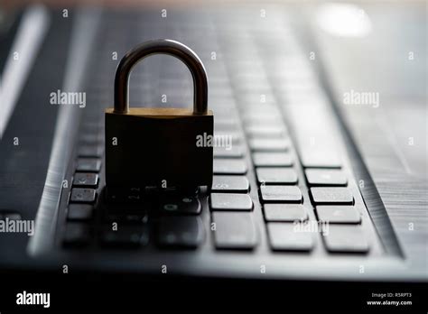Computer Keyboard And Padlock As A Symbol Of Internet Security Stock Photo Alamy