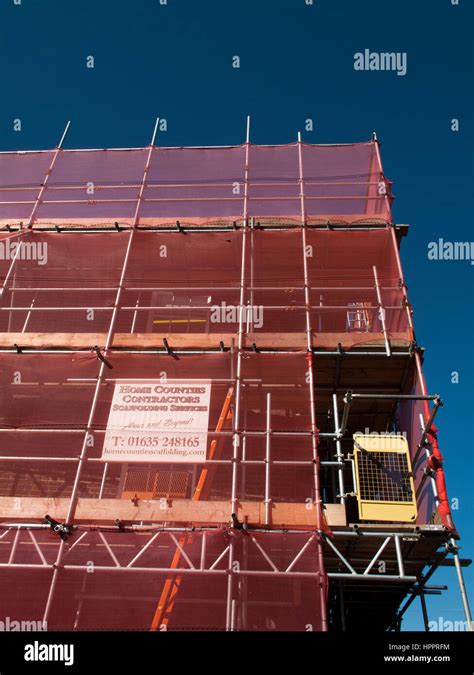 Industrial Scaffolding With Health And Safety Protection Mesh Stock Photo Alamy
