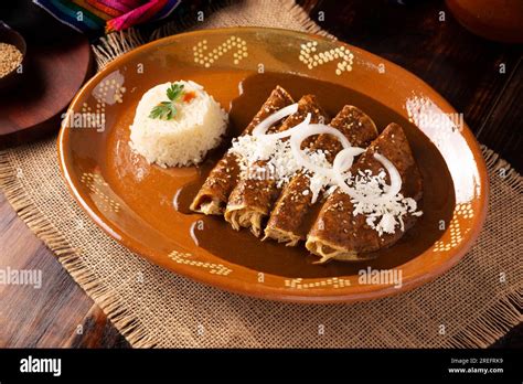 Chicken Enmoladas Also Known As Mole Poblano Enchiladas They Are A