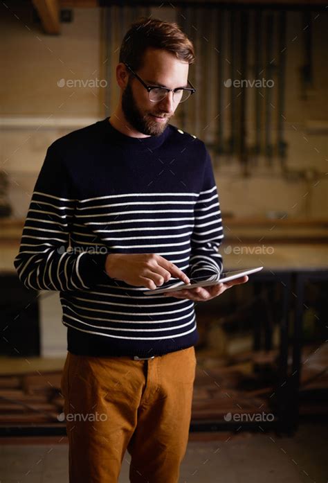 Using Touchscreen Technology Cropped Shot Of A Hipster Using A