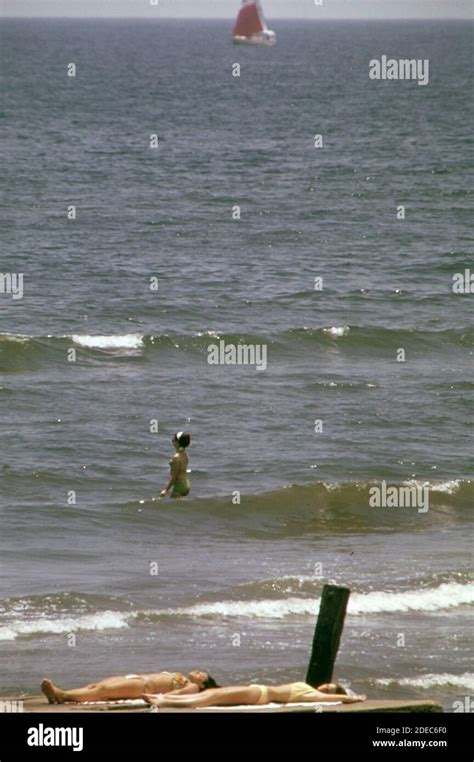1970s Photo 1973 Sunbathers Swimmer Sailboat View From West
