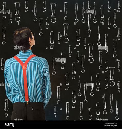 Nerd Geek Businessman Babe Or Teacher With Chalk Exclamation Marks On Blackboard Background