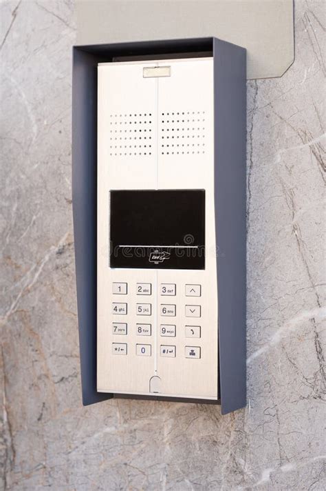 Manual Push Button Metal Keypad Of Access Systems Installed On Marble