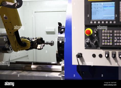 CNC Machining Center With Collaborative Robot For Automation Of Loading