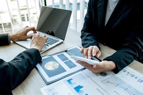 Premium Photo Man Using Laptop On Table