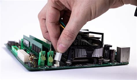 Engineer Repairman Holding Hands In Black Gloves Chip Processor Cpu To