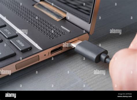 Closeup Of USB Type C Grey Cable Being Connected To The Laptop Computer Stock Photo Alamy