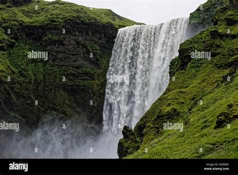 Seljalandsfoss Waterfall Plunging 60m From The Cliff Above Sudhurland