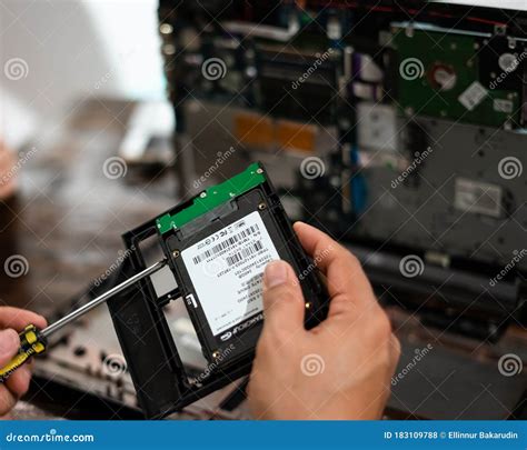 Changing The Hard Drive With Cd Rom Inside Laptop At Home DIY Project At Home Editorial Stock