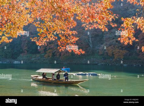 Beautiful Fall Color And Katsura River With Boat At Arashiyama Kyoto