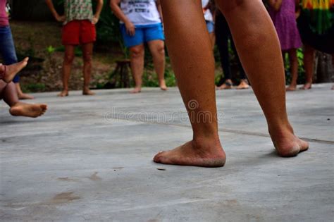 Bare Foot Group Of People In A Circle On A Cultural Activity Ground