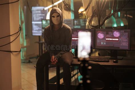 Cyber Criminal In Mask Hacking Password Breaking Computer System Stock